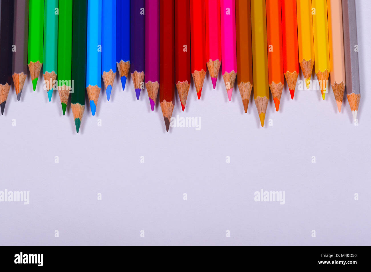 Colored pencils on white background Stock Photo - Alamy