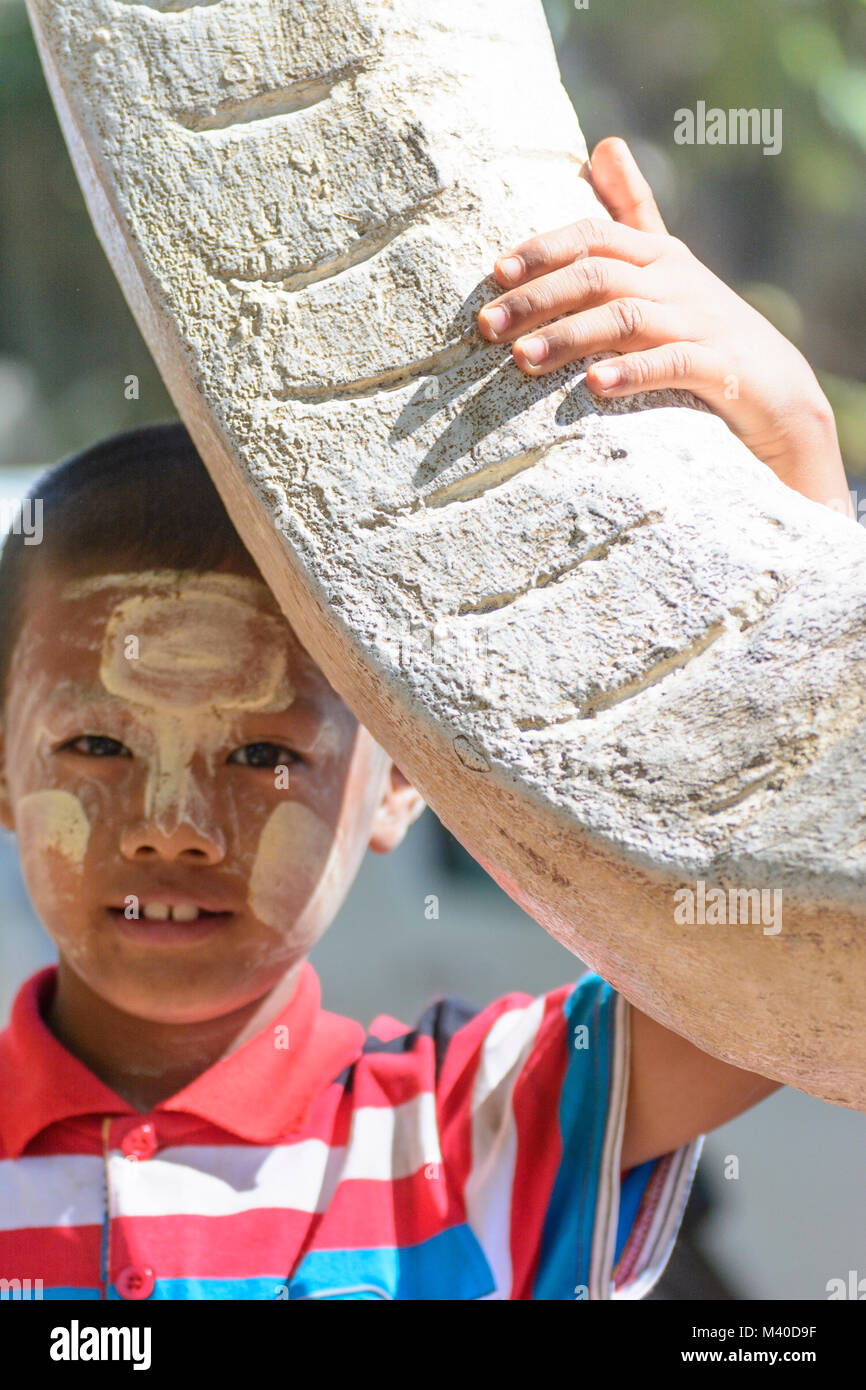 Hpa-An: boy, face with thanaka cosmetic paste, , Kayin (Karen) State ...