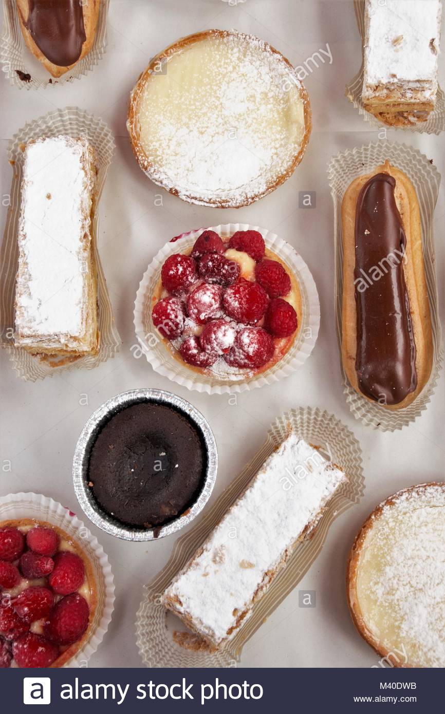 English pastries and tarts lying on a table for sale at a Saturday food ...