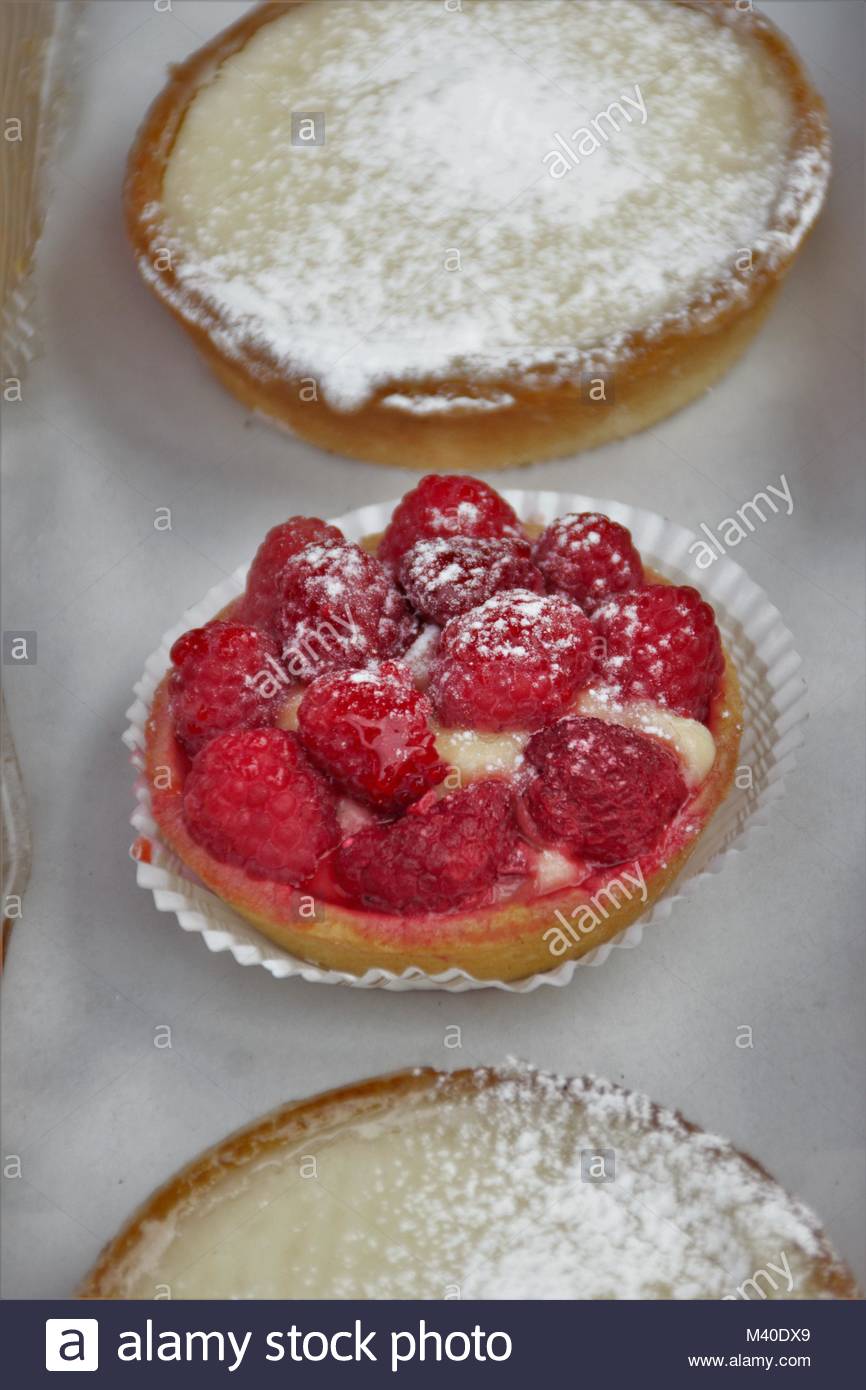 English pastries and tarts lying on a table for sale at a Saturday food ...