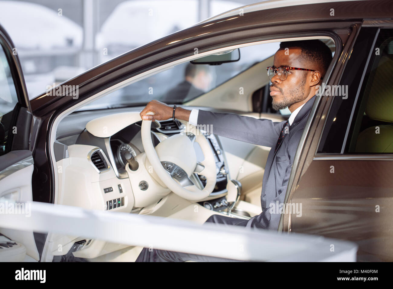 Stylish black man in car Stock Photo - Alamy