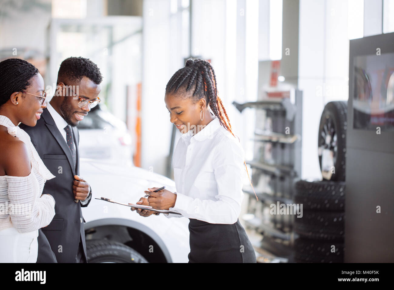 Car salesman sitting desk in hi-res stock photography and images - Alamy
