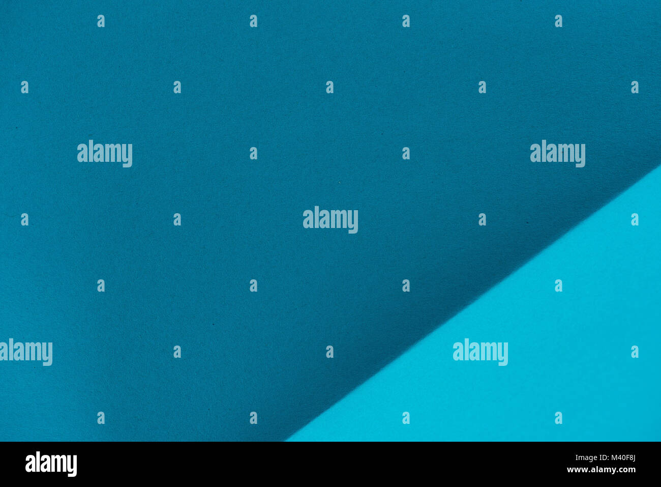 close-up shot of folded blue paper Stock Photo - Alamy