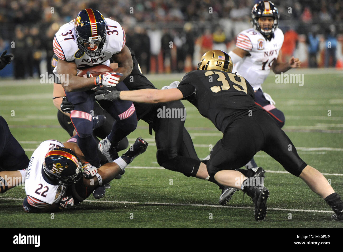 141213-D-FW736-053 –Navy fullback Chris Swain rushes for a short gain ...