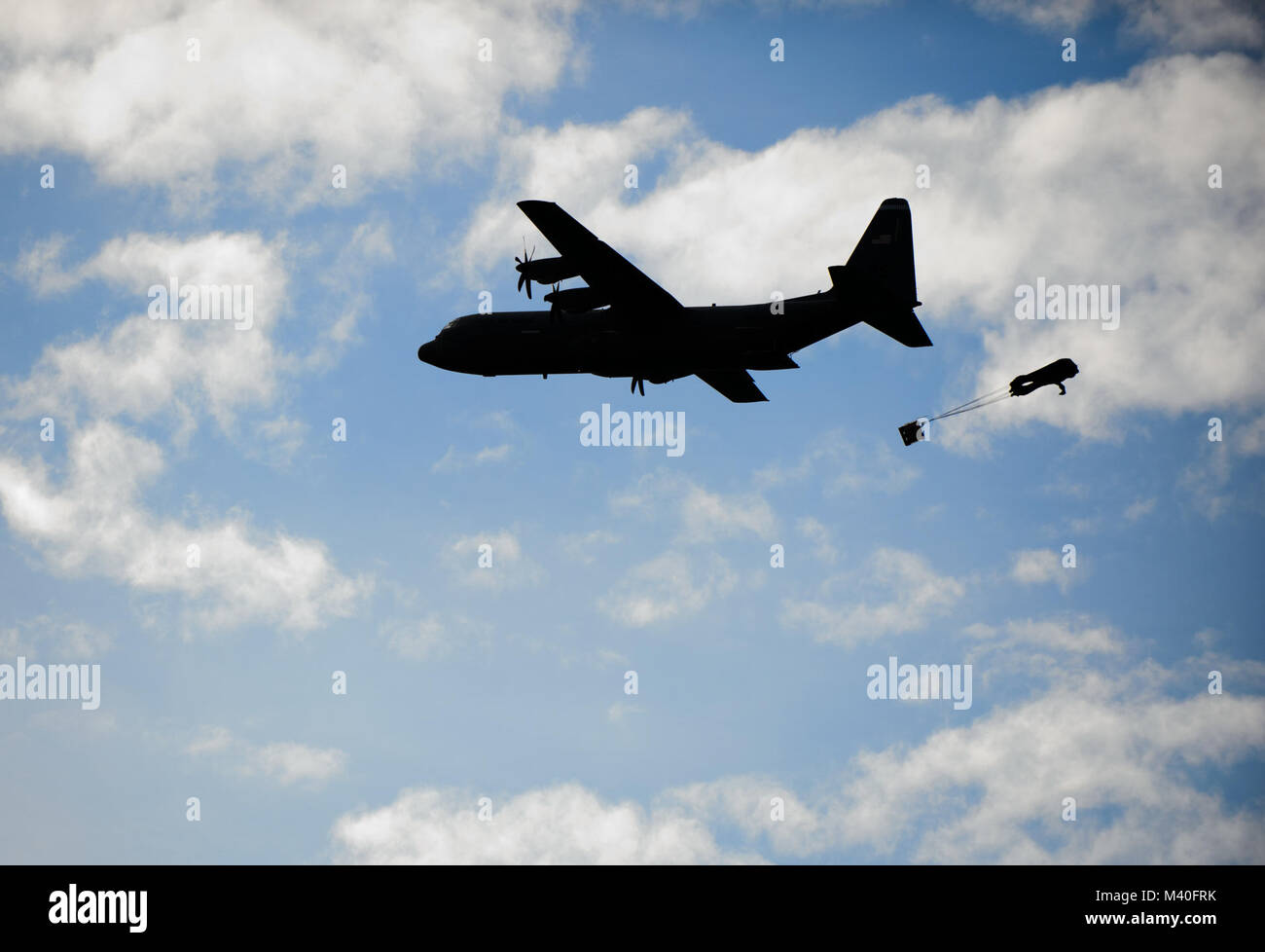 A Ramstein Air Base, C-130J Super Hercules drops a toy box during a ...
