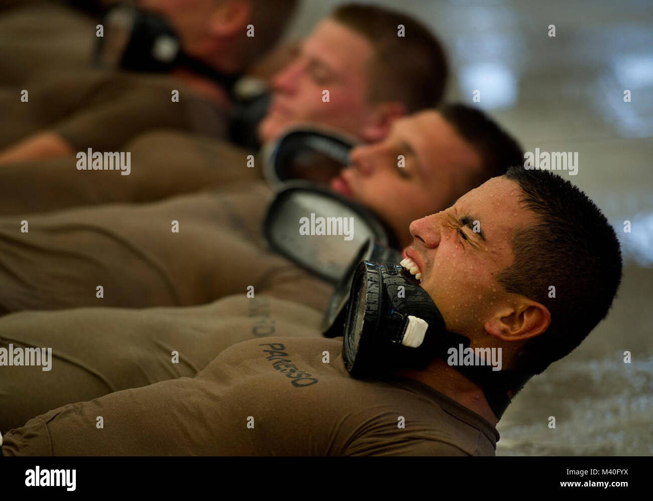 Airmen perform the flutter kick exercise during the water confidence ...