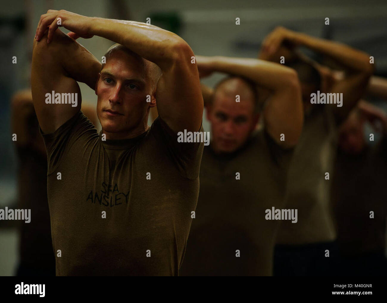 Air Force pararescue trainees stretch during circuit training at Medina ...