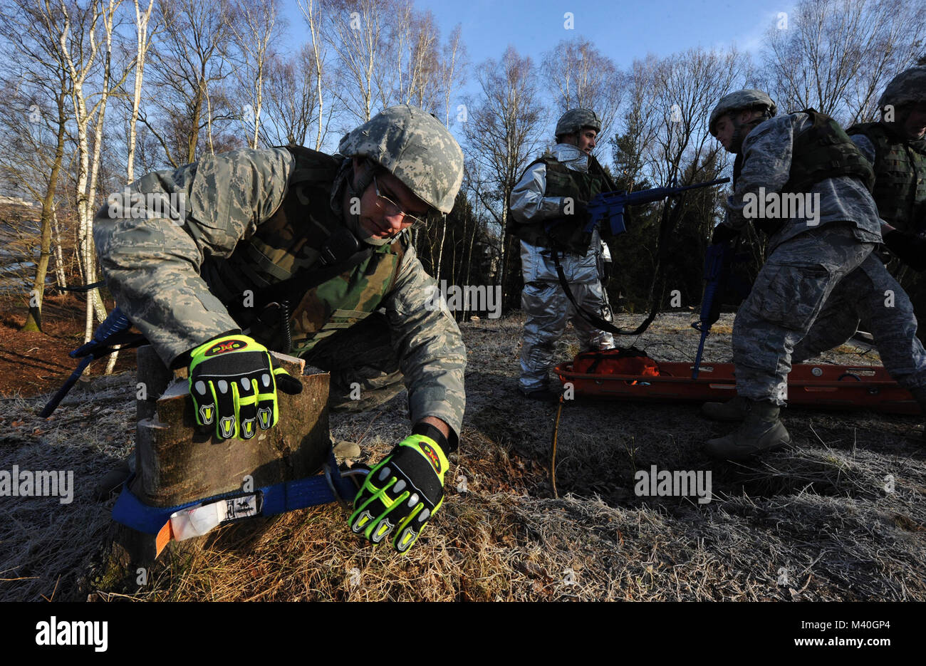 U.S. Air National Guard Technical Sergeant Derek Lotz (left), a ...