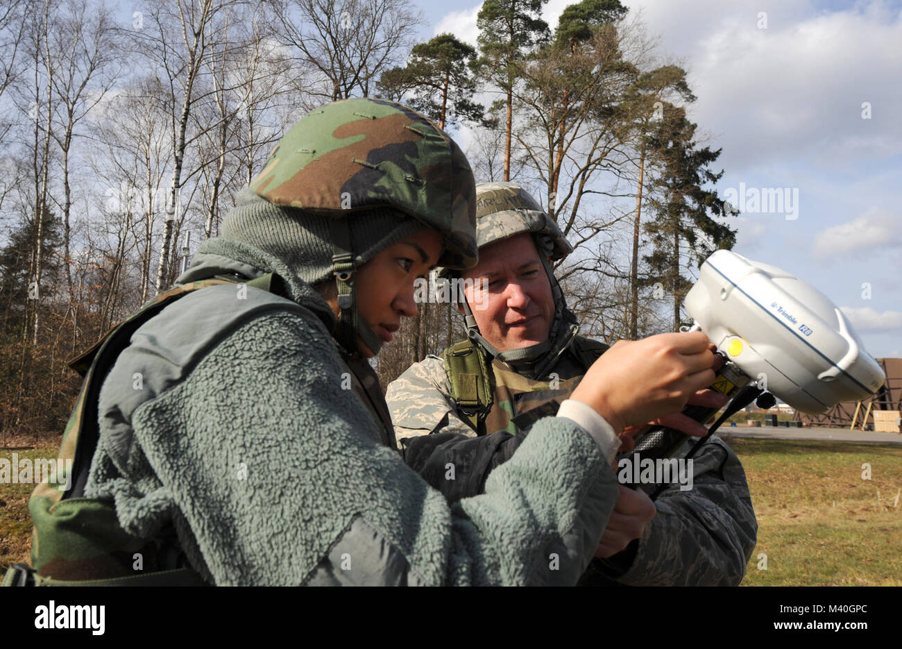 U.S. Air Force Staff Sergeant Joyce David (left), an engineering ...