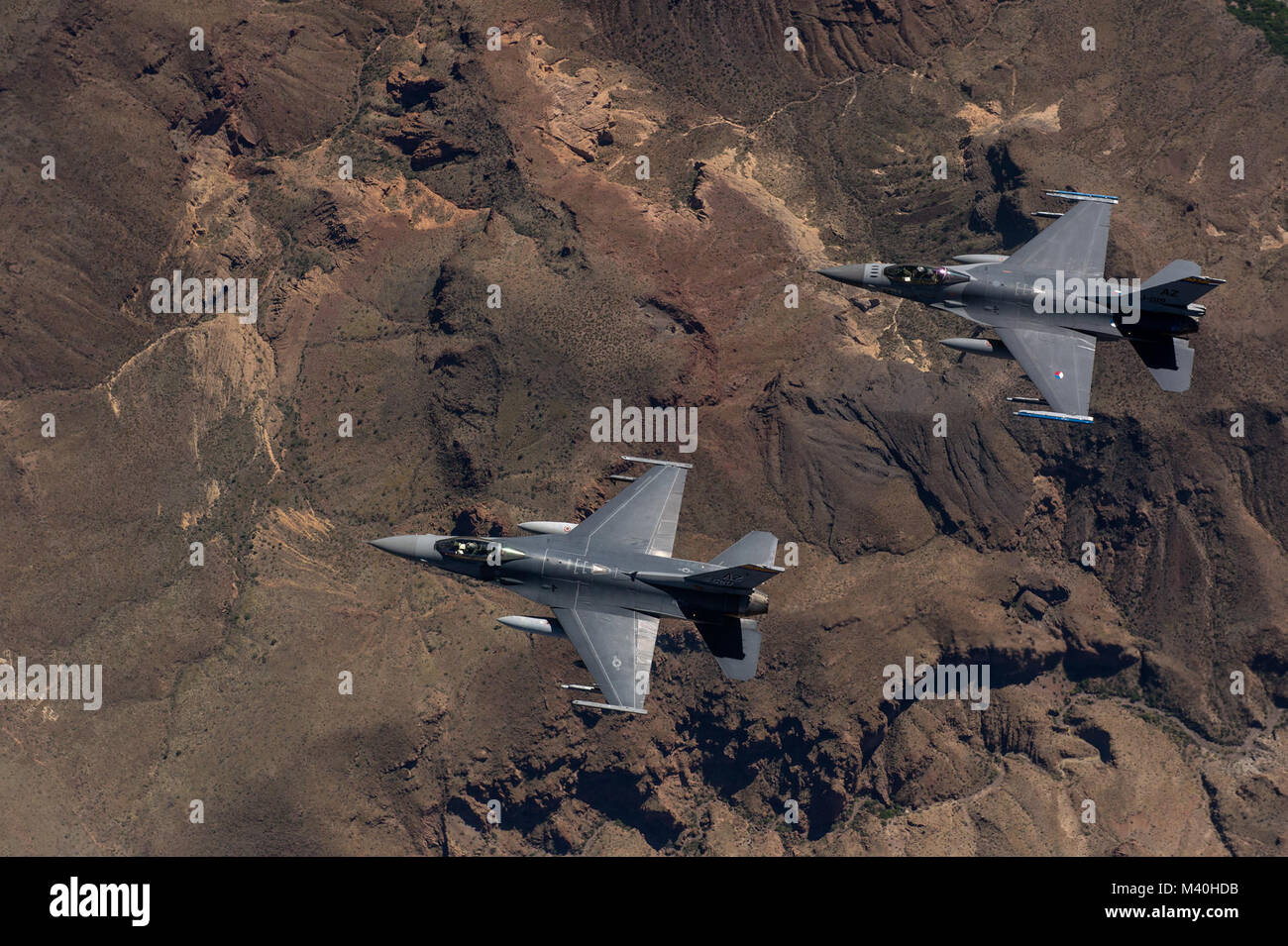 F-16 Fighting Falcons from the 162nd Wing, Tucson, Arizona fly over an ...
