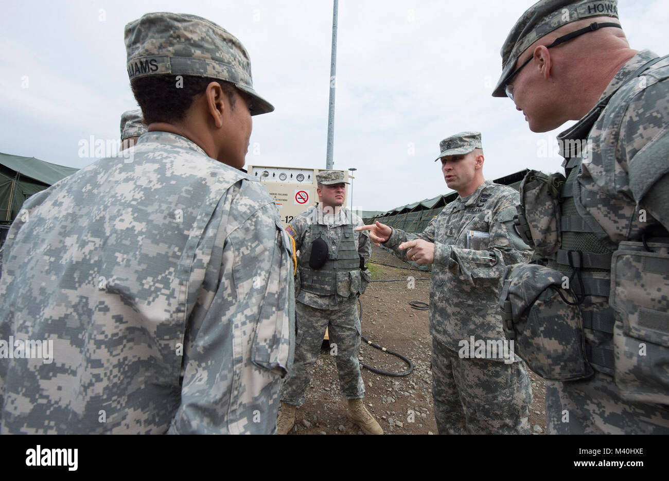 Command Sergeant Major (CSM) Rodney Rhoades (right), the 21st Theater ...
