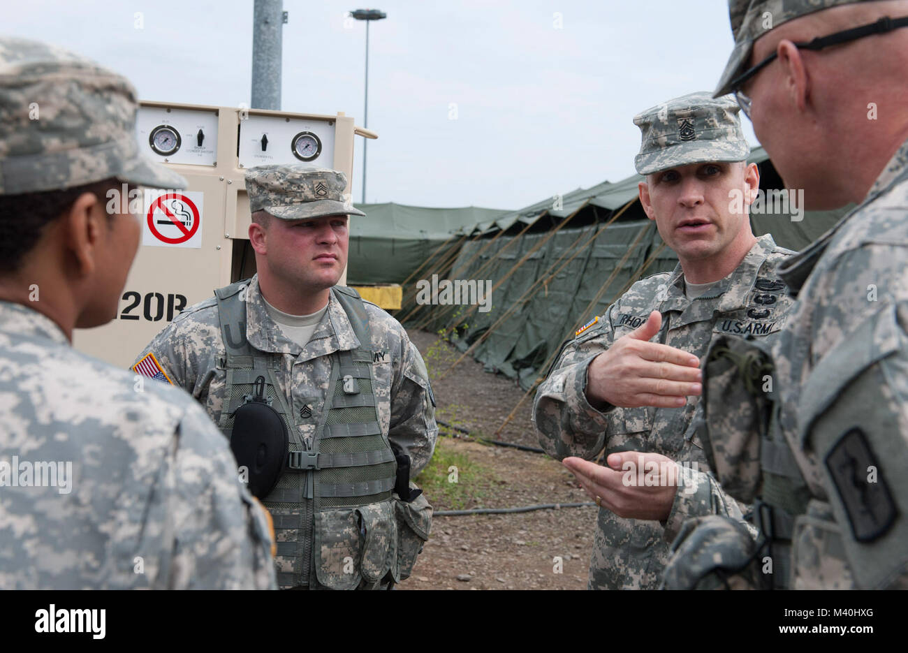 Command Sergeant Major (CSM) Rodney Rhoades (right), the 21st Theater ...