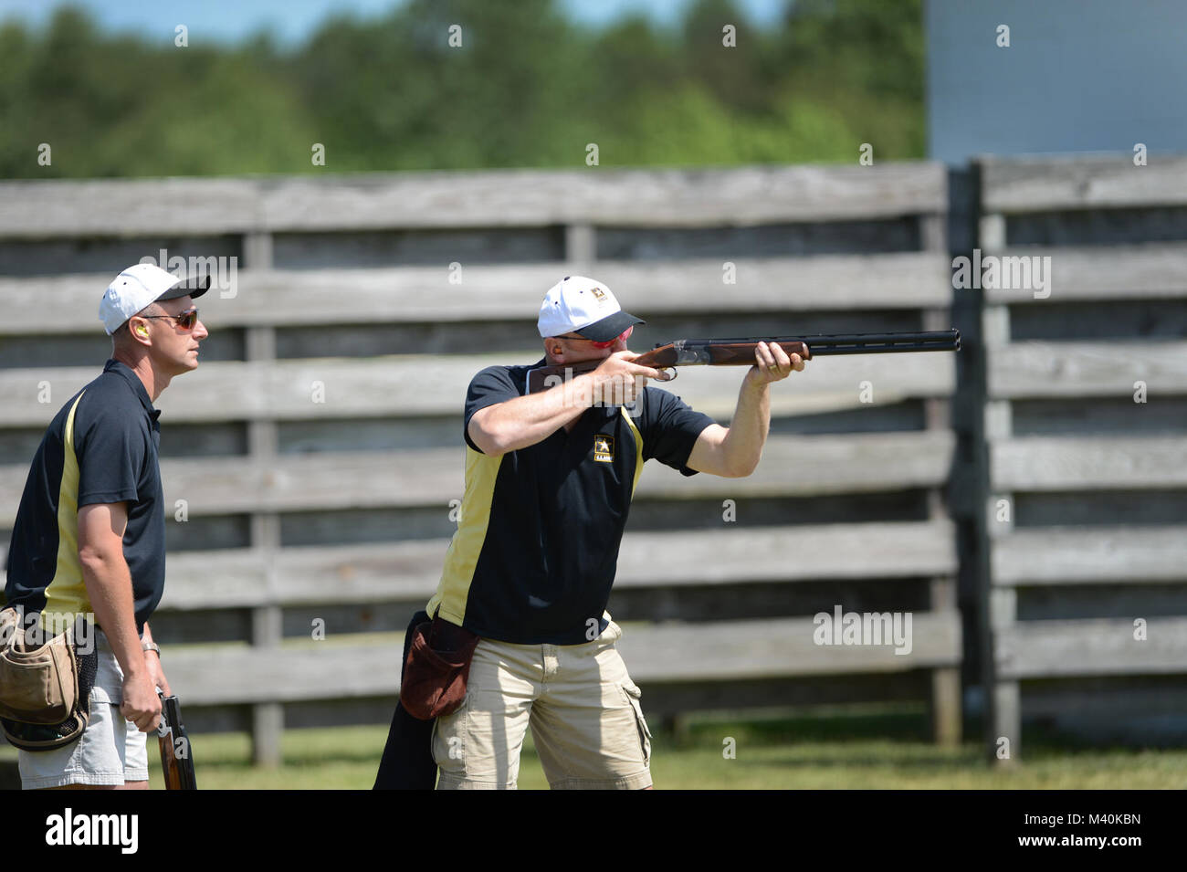 Army Maj. Dave Guida, a member of the Army Skeet Team, shoots during ...