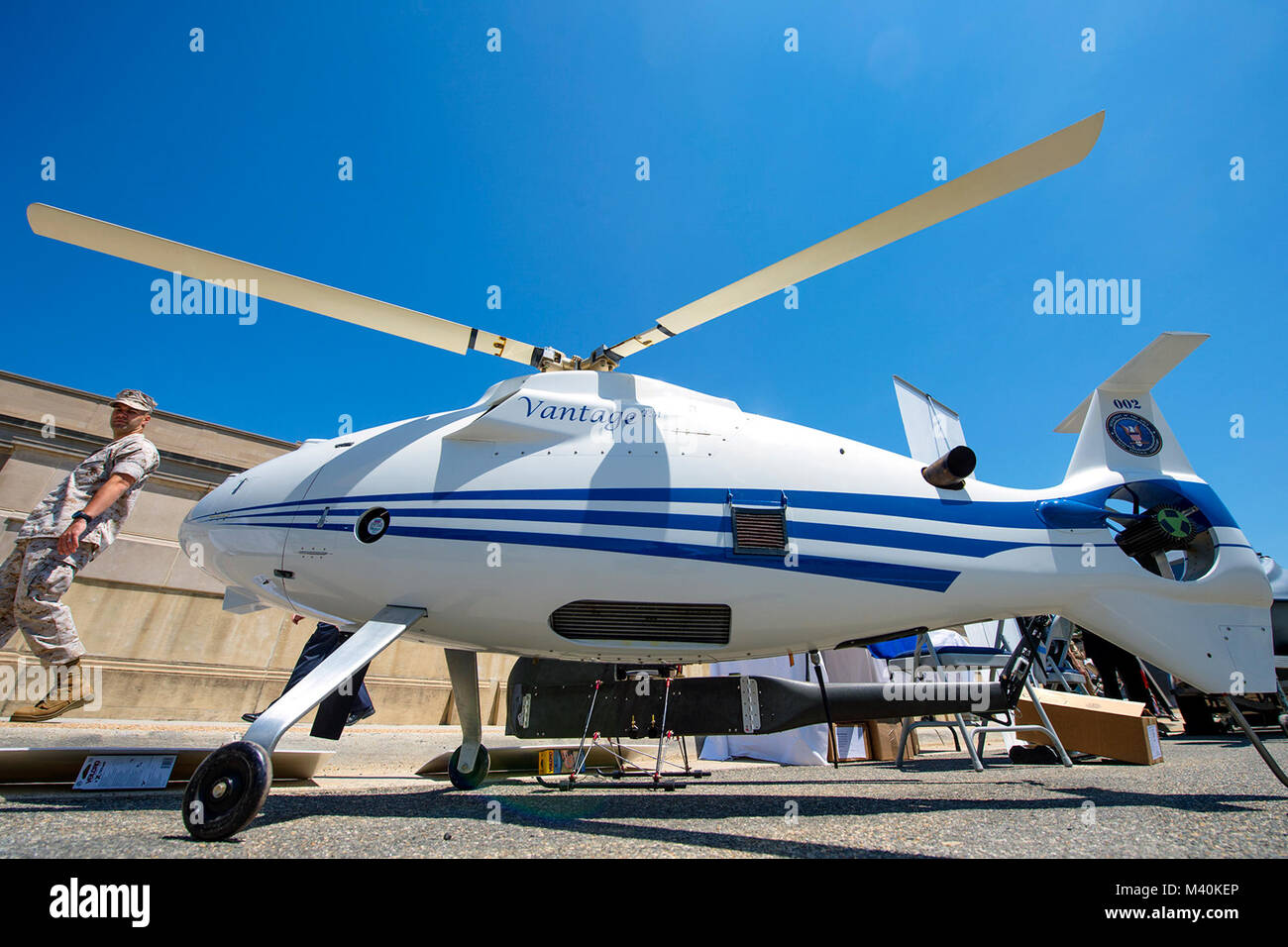 A marine walks past a remote piloted aircraft outside the Pentagon ...