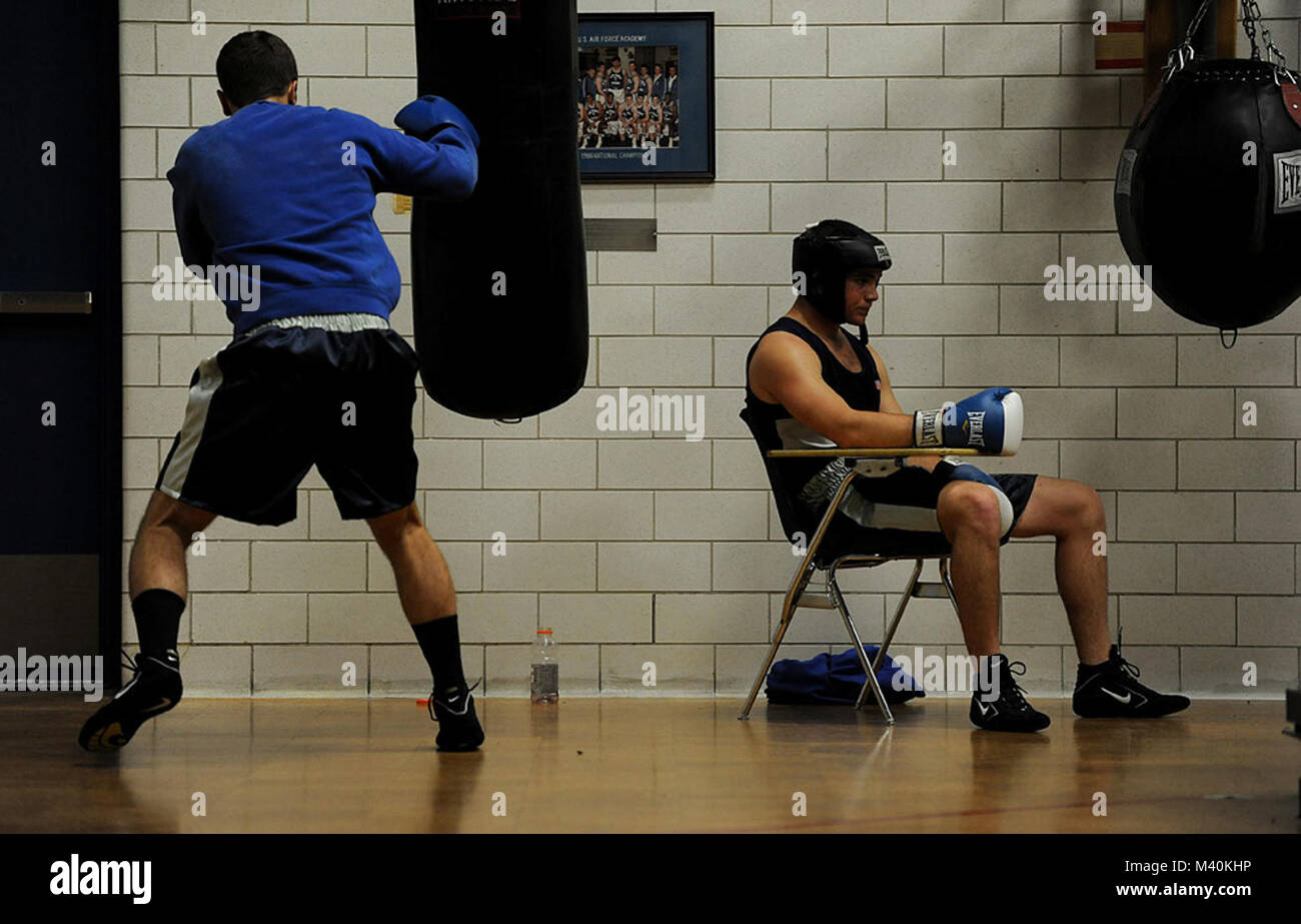 U.S. Air Force Academy Cadet Third Class Derek Demyanek sits at a desk ...