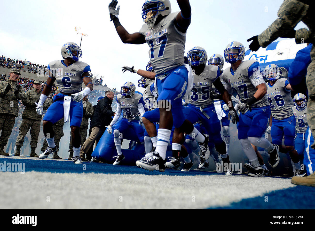 The U.S. Air Force Academy football team takes the field before their ...