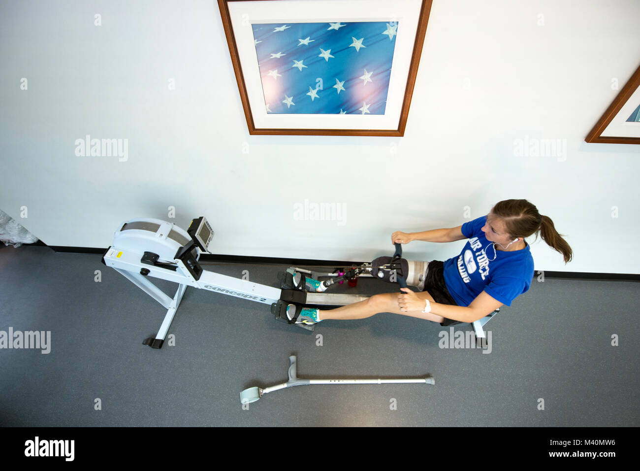 Air Force Capt. Christy Wise works out on a rowing machine as she ...