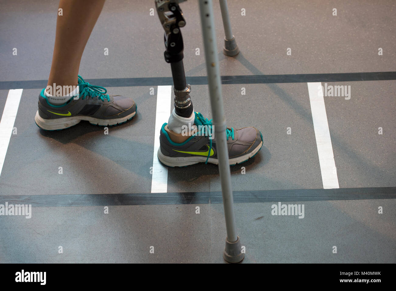 Air Force Capt. Christy Wise practices walking with an artificial limb ...