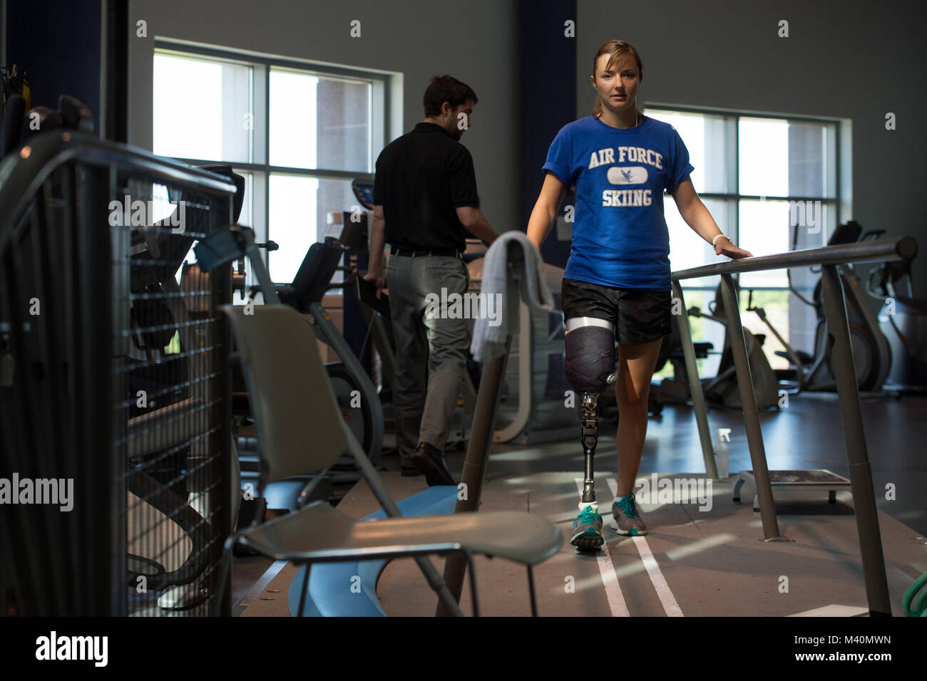 Air Force Capt. Christy Wise practices walking with an artificial limb ...