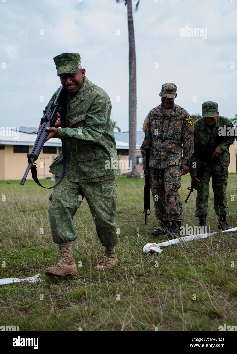 A soldier with the Belize Defense Force practices house-clearing ...