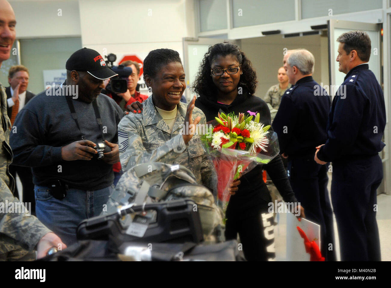 Chief Master Sgt. Ruth Pitts is greeted by her daughter, Cicely Pitts ...