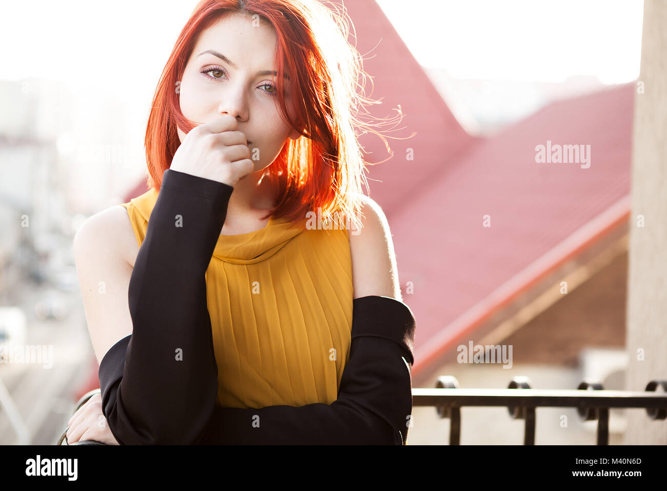 Outdoor portrait of beautiful redhead woman Stock Photo - Alamy