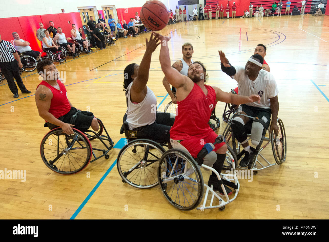 Teams Marine Corps and Army battle for a rebound during wheelchair ...