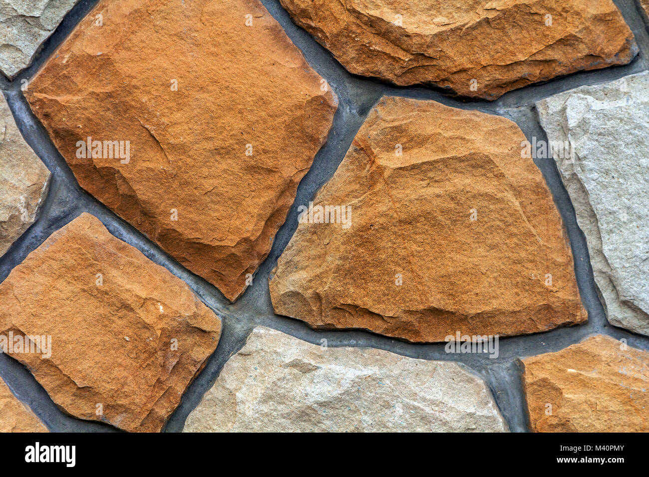 Different sizes of sand stones. Stone wall pattern background Stock ...