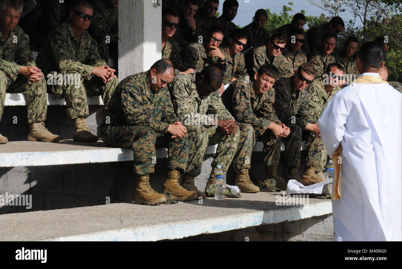 Navy Chaplain Lt. Thomas Pham, a native of Houston, Texas, assigned to ...