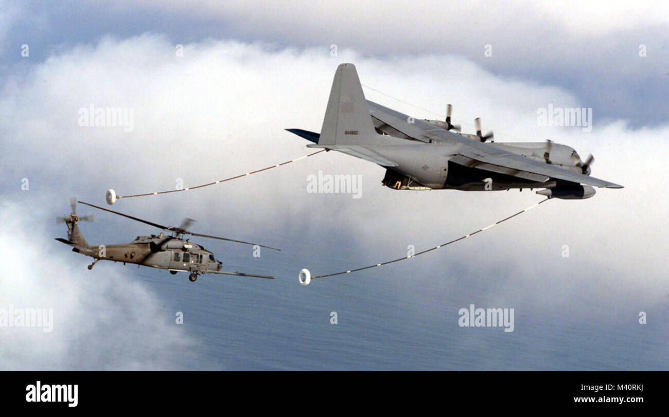 55th rescue squadron HH-60 moves in to refuel off of the 79th rescue ...