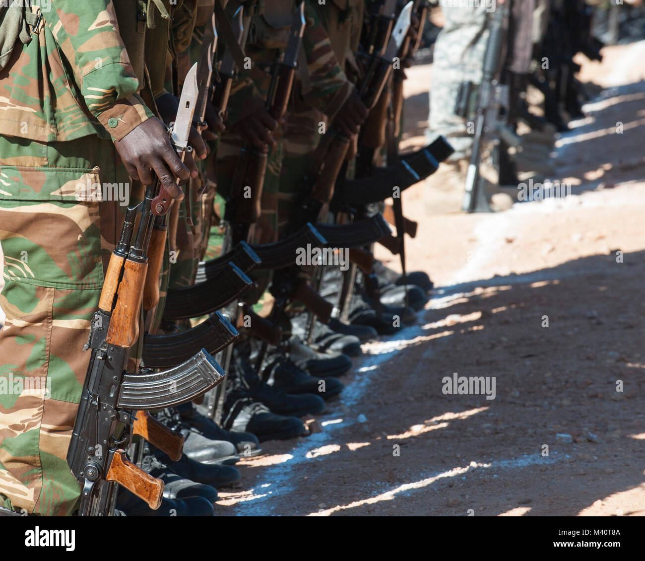 Soldiers with the United States Army stand alongside soldiers with the ...