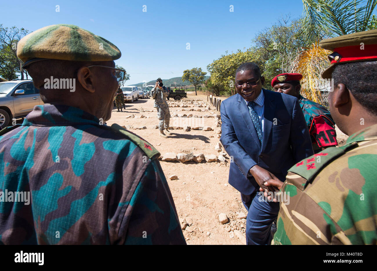 Mr. Christopher Mulenga, the Zambian Deputy Minister of Defense, shakes ...