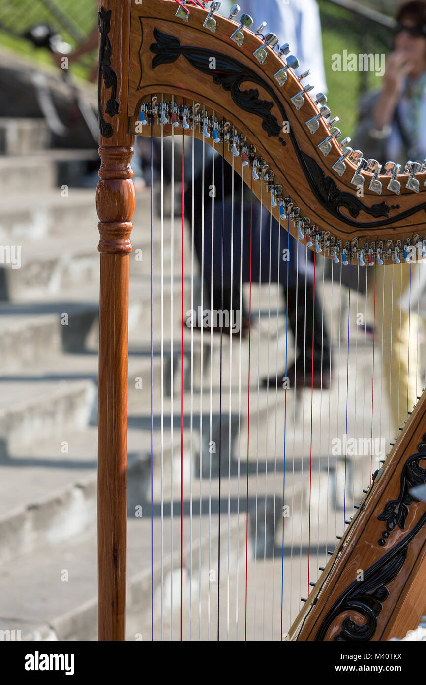 A symphony musical instrument called harp details Stock Photo - Alamy