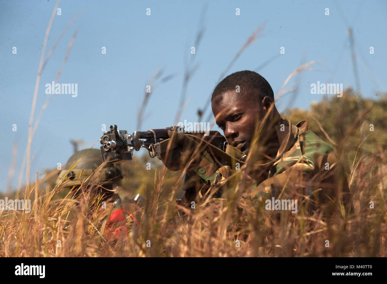 A member of the Zambian Defense Force rehearses tactical movements ...