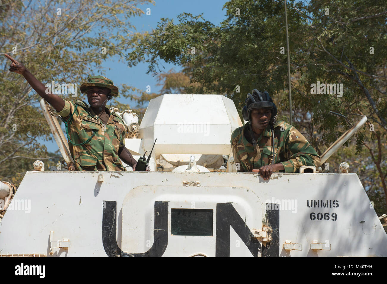 Soldiers with the Zambian Defense Force communicate with ground troops ...