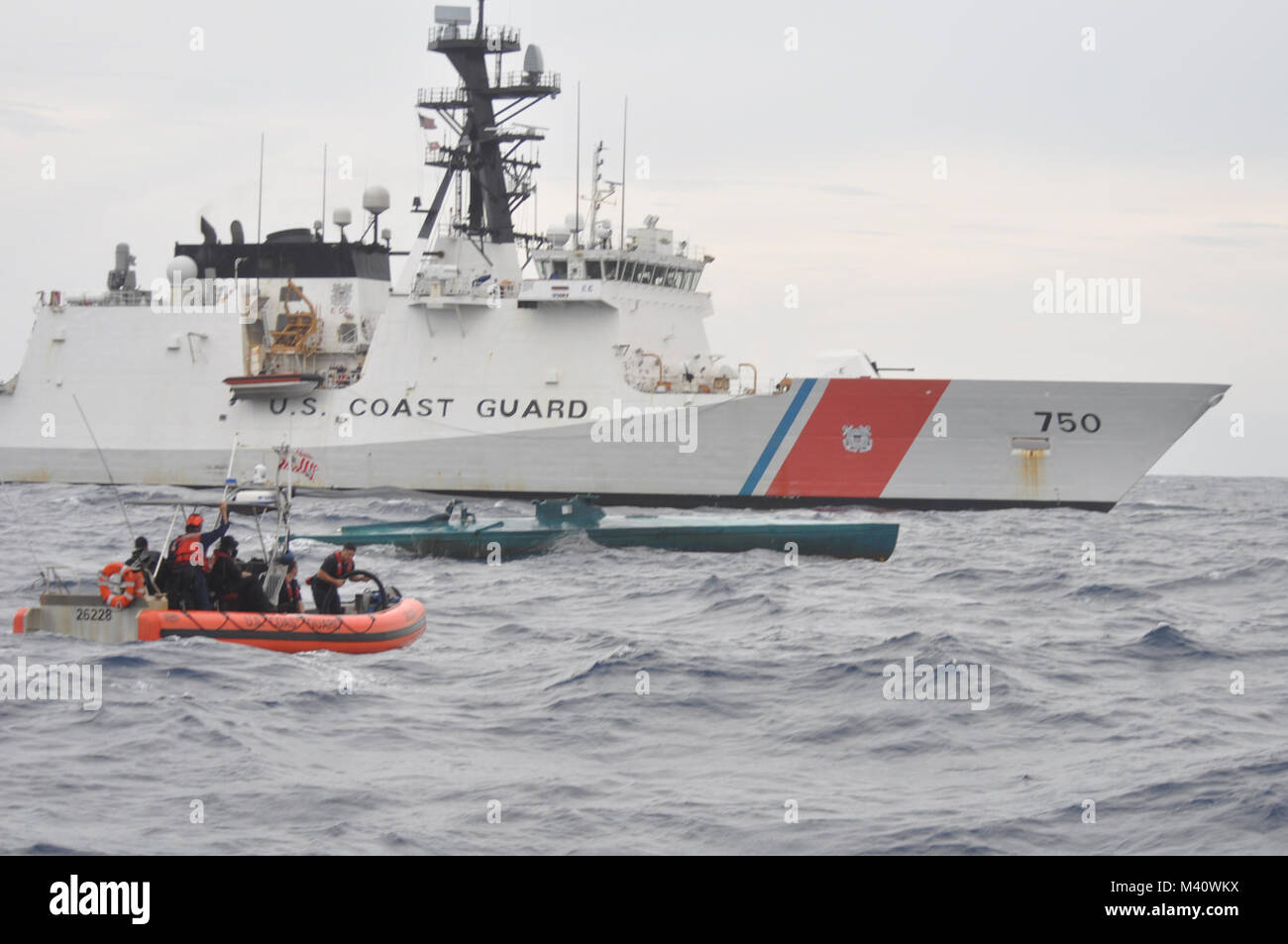 A Coast Guard Cutter Bertholf boarding team aboard an Over the Horizon ...