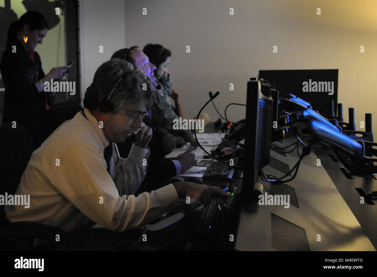 Defense Media Activity (DMA) personnel man the control room during ...