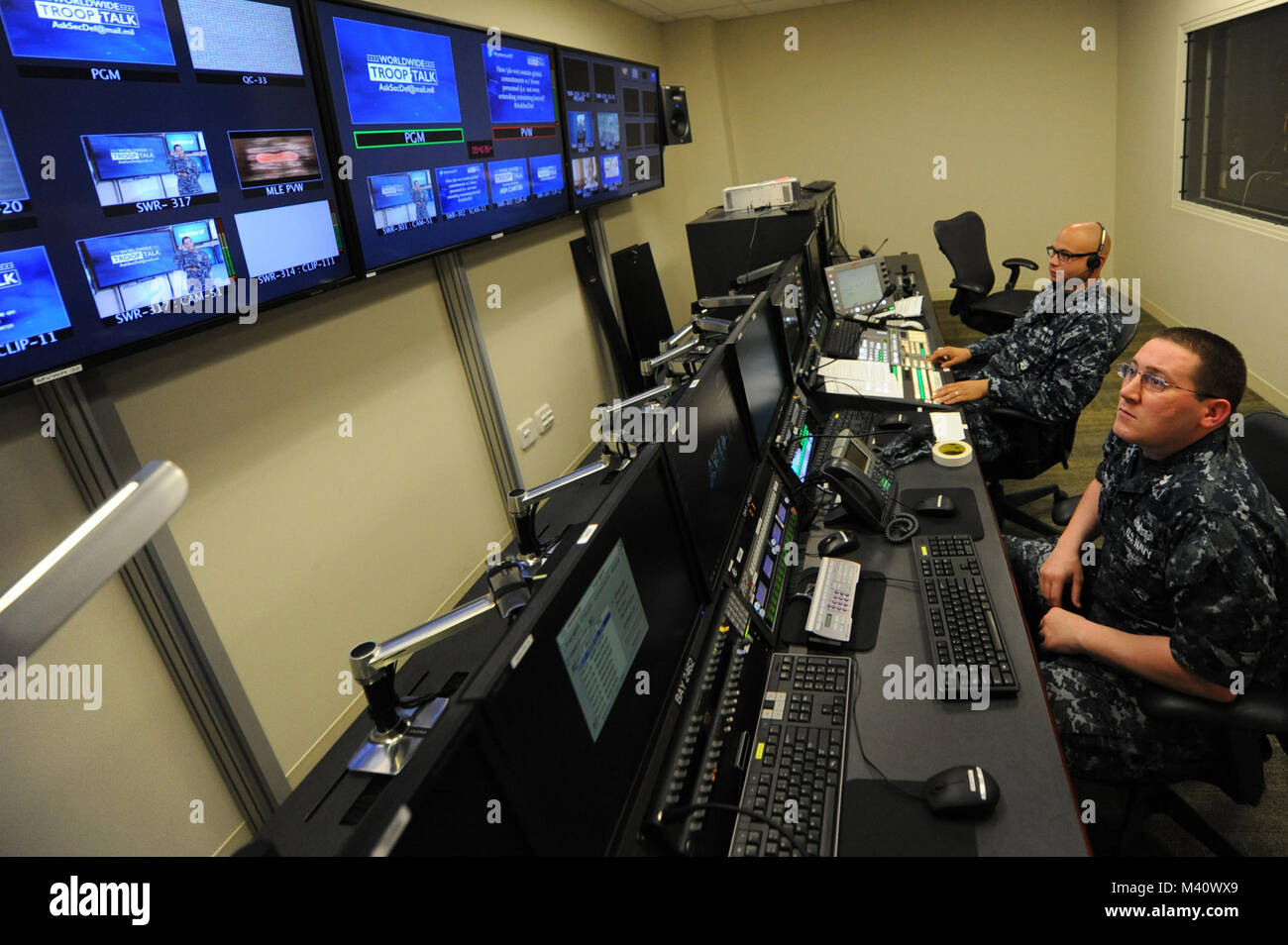Defense Media Activity (DMA) personnel man the control room during ...