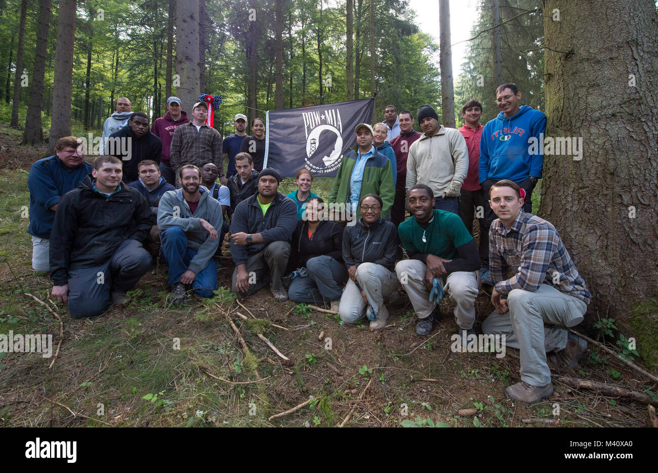 Members of the Defense POW/MIA Accounting Agency (DPAA) and United ...