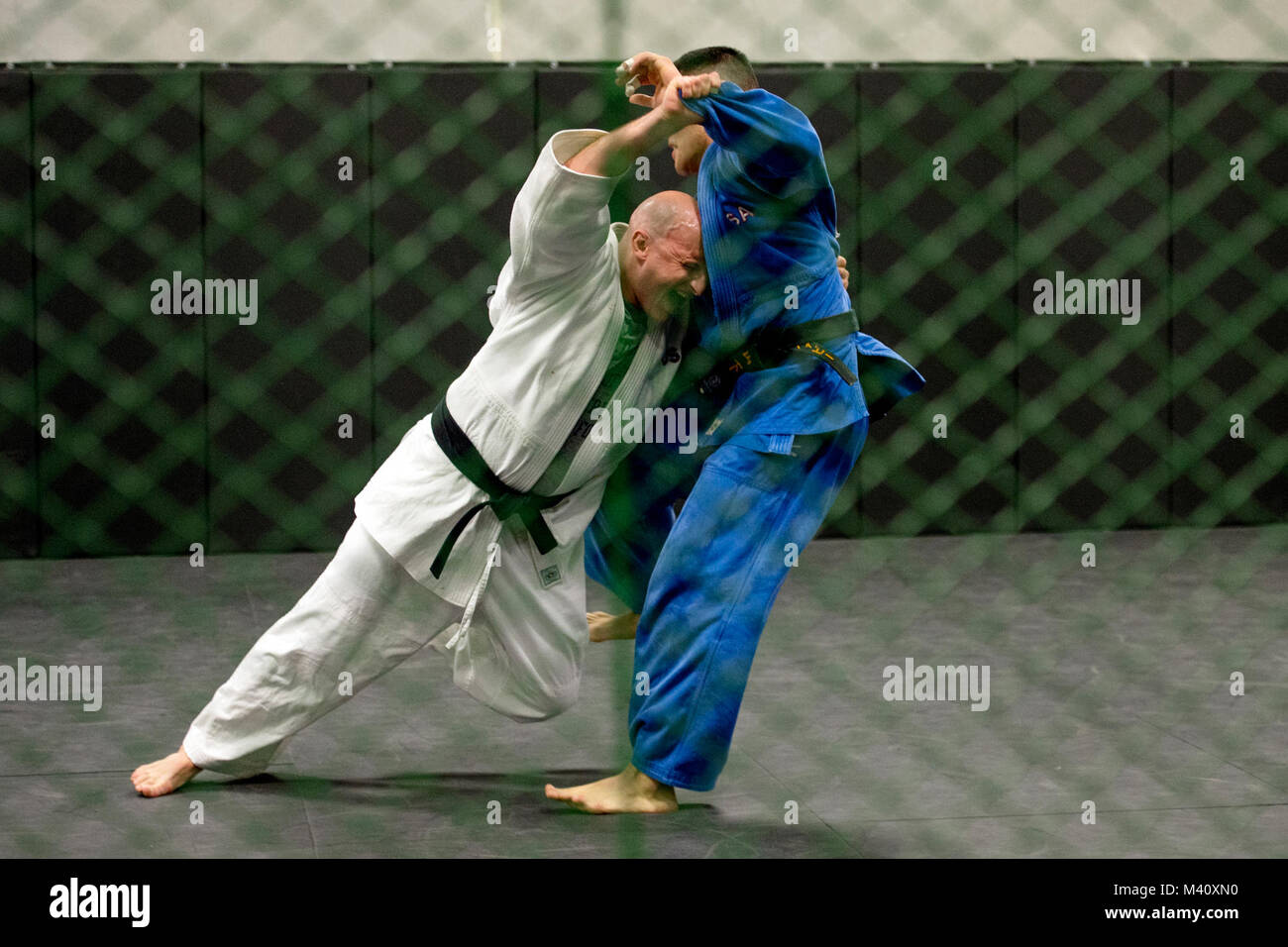 Army Lt. Col. Ben Ring, left, and Navy Petty Officer 2nd Class Bobby Yamashita spar during U.S ...