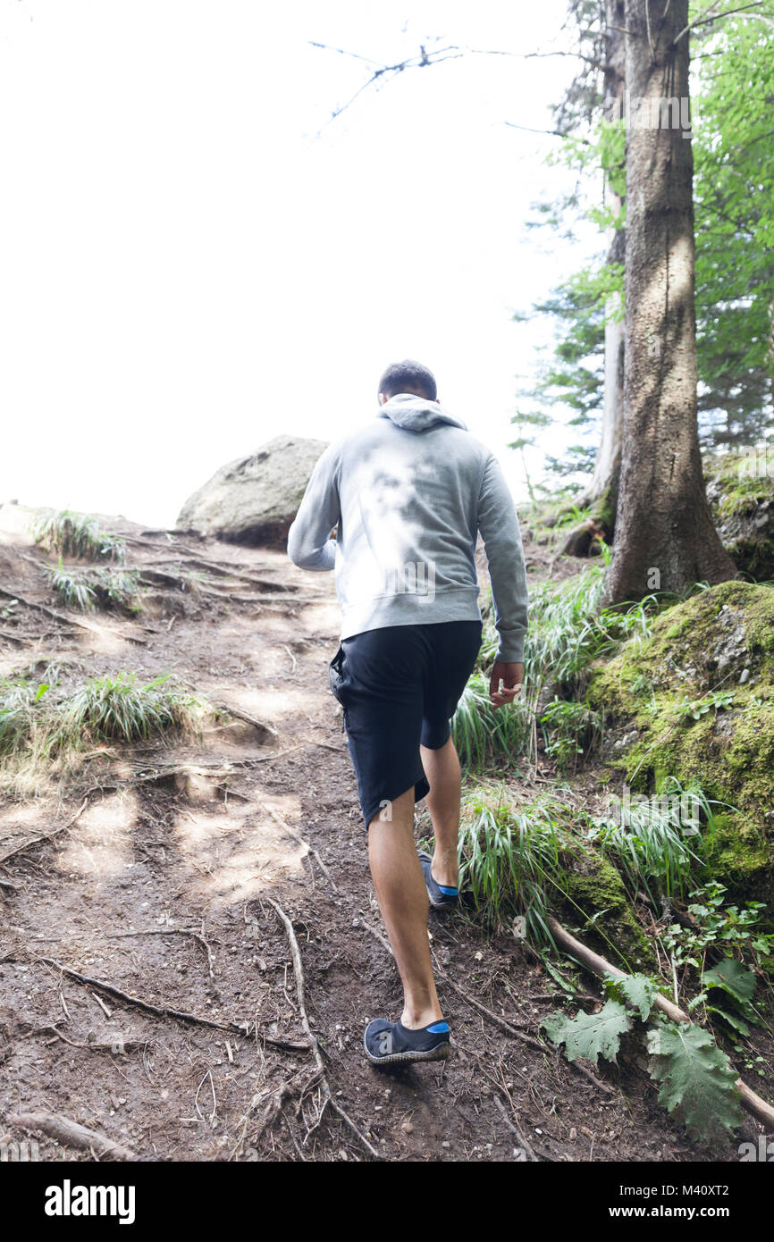 Young man from back running hi-res stock photography and images - Alamy