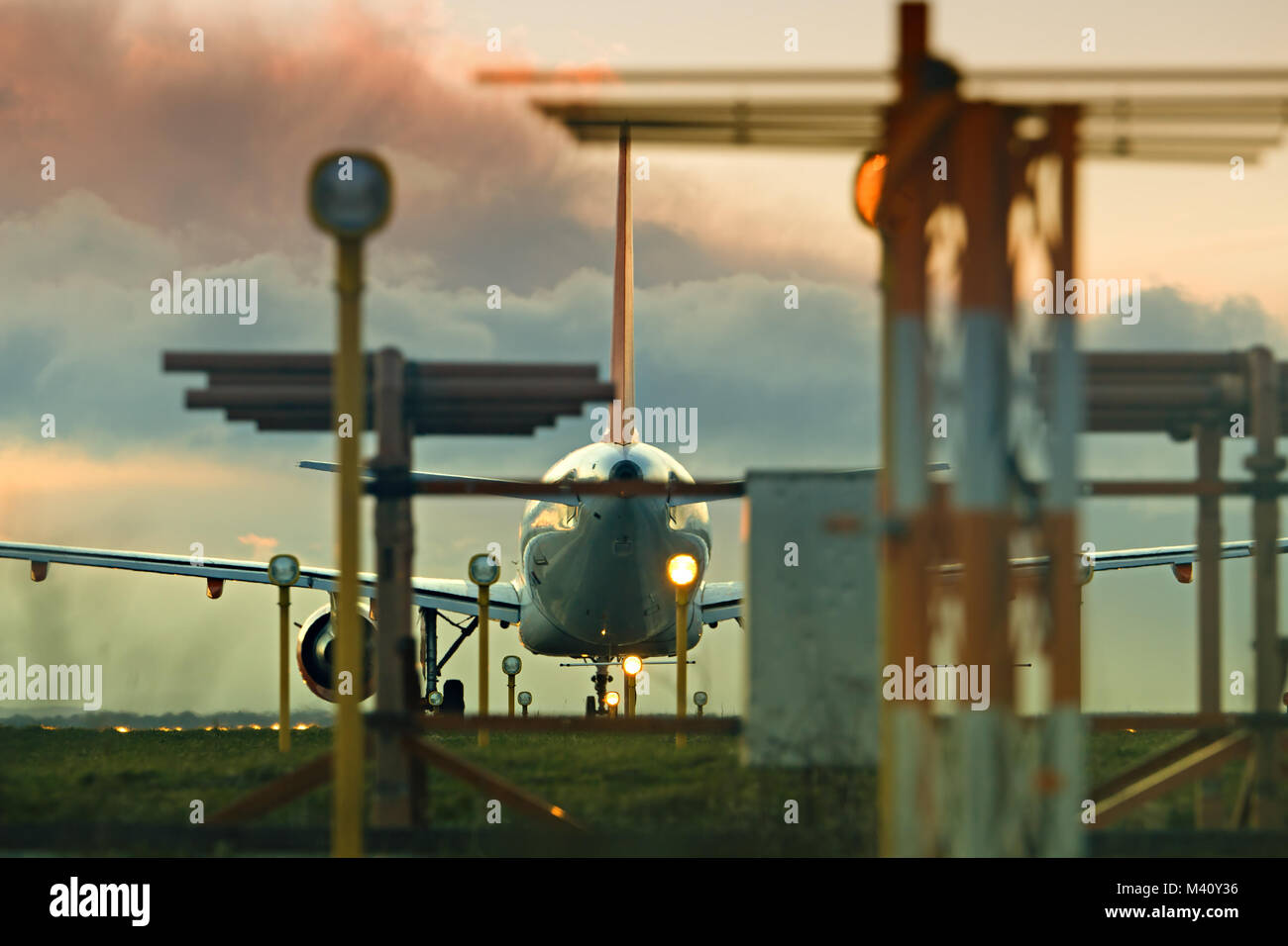 An Easyjet plane lining up on the runway ready for take off with ...