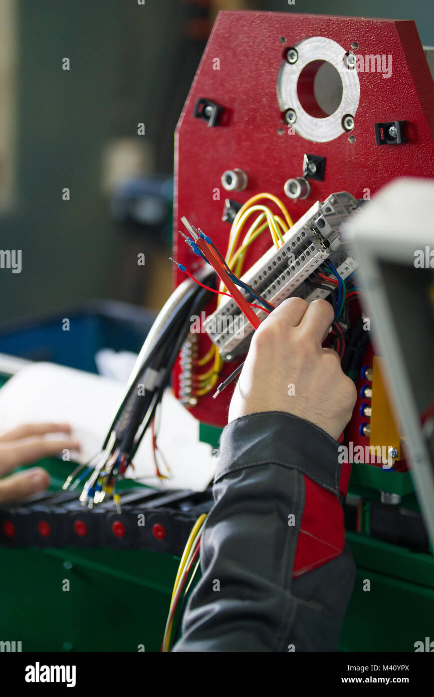 Electrician installing electric meter hi-res stock photography and ...