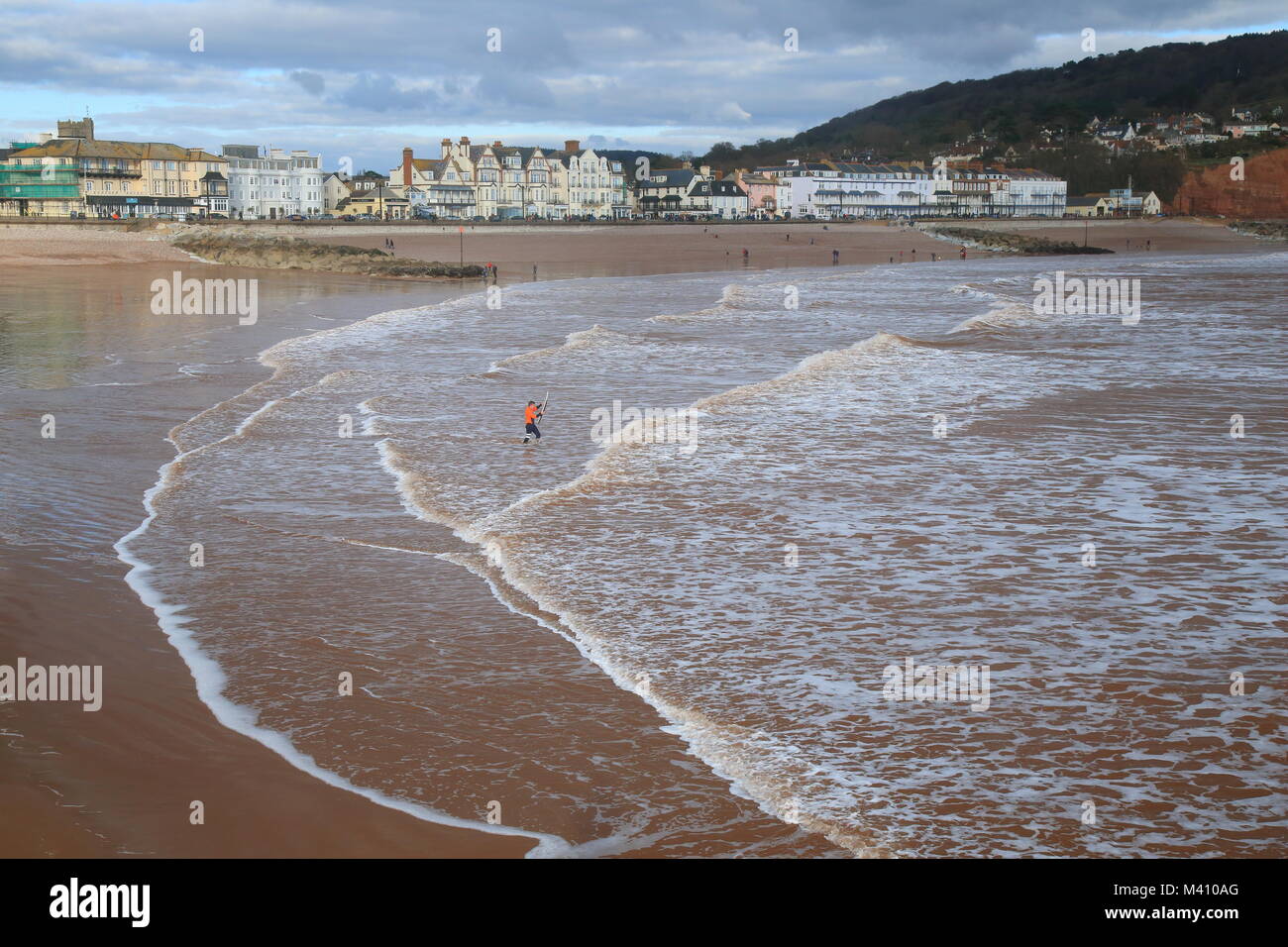 Sea waves on the sandy beach of Jurassic Coast in Sidmouth, Devon Stock ...