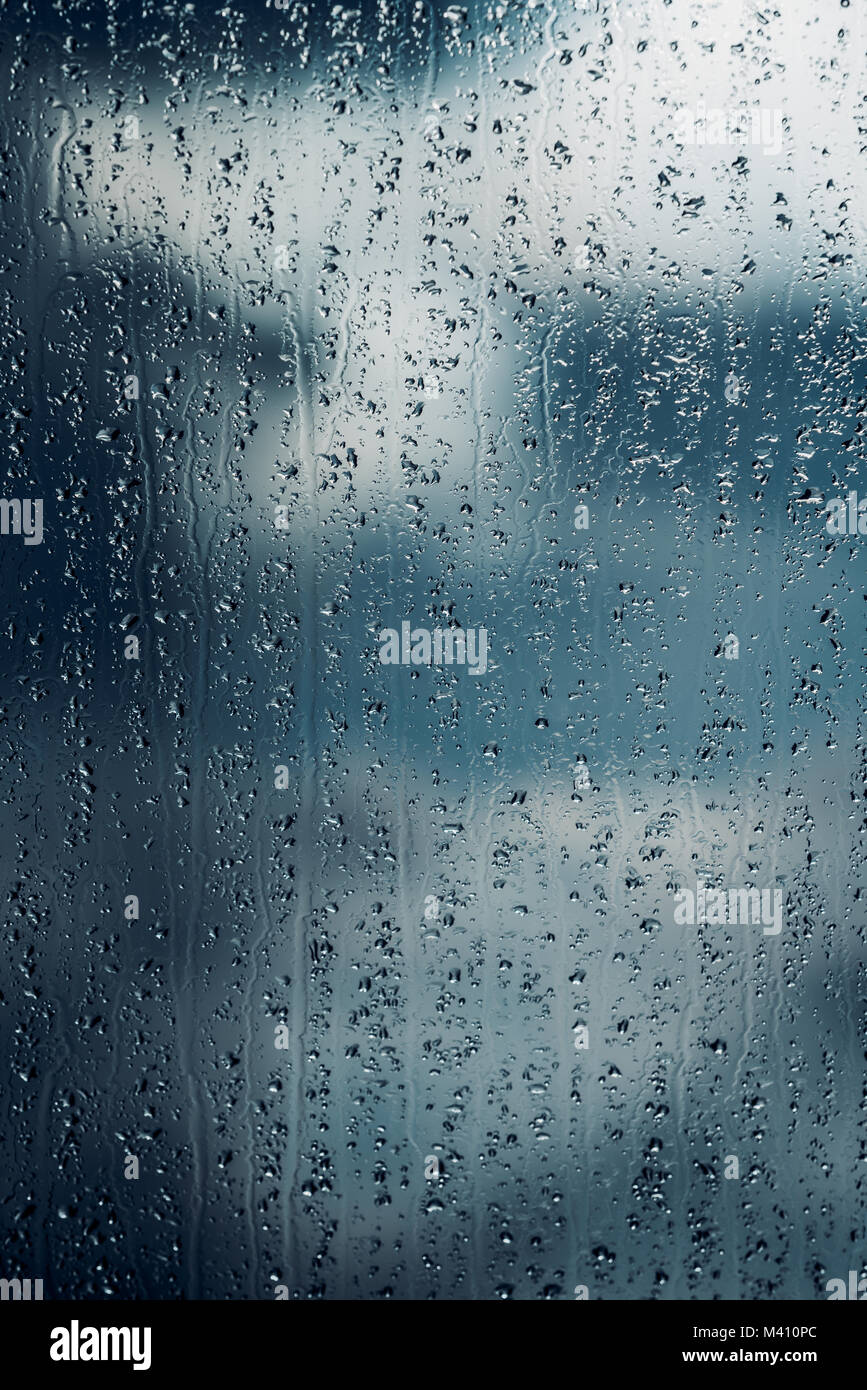 water drops of rain on a window glass. Rainy day Stock Photo - Alamy