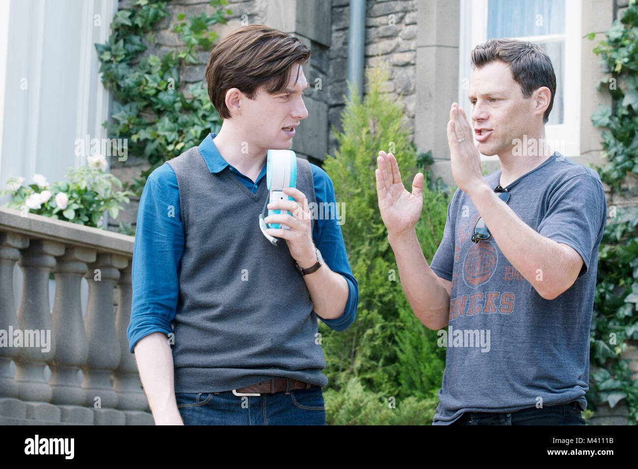 PETER RABBIT, from left: Domhnall Gleeson, Director Will Gluck on set ...