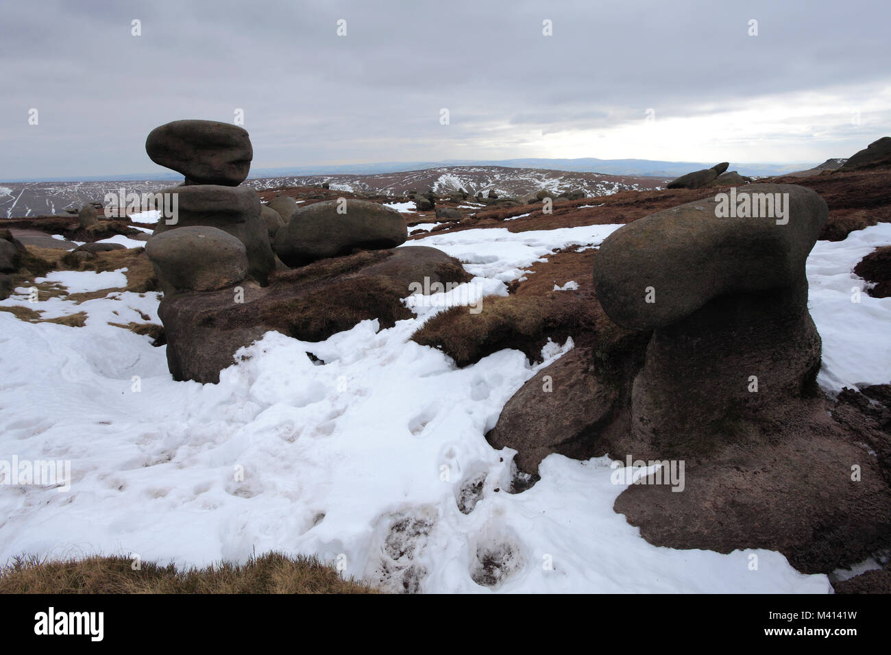 Winter snow on the Woolpacks rocks, Kinder scout, Peak District ...
