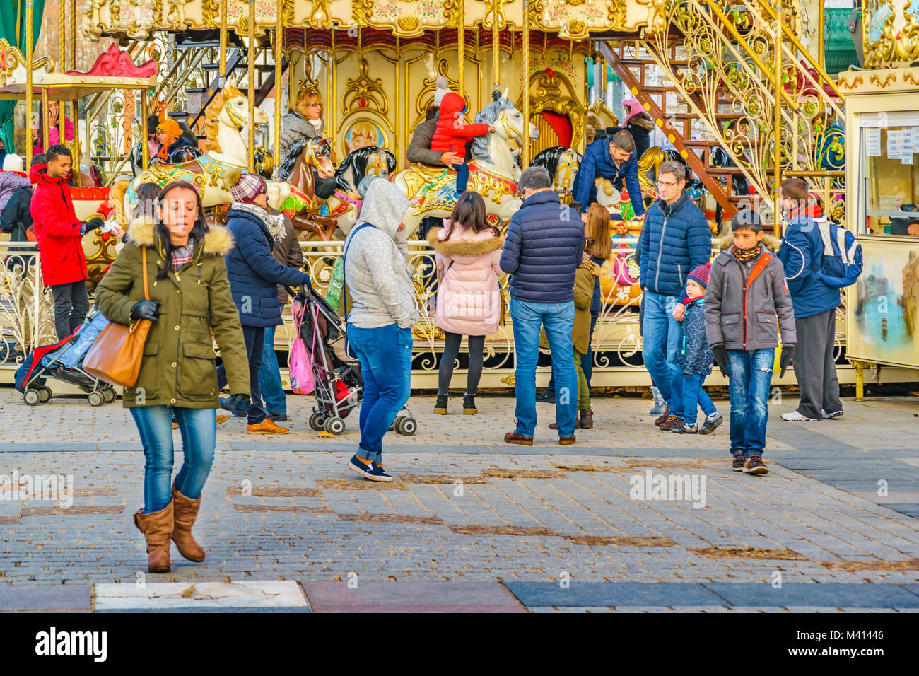 MADRID, SPAIN, DECEMBER - 2017 - Crowded scene at royal palaca street ...