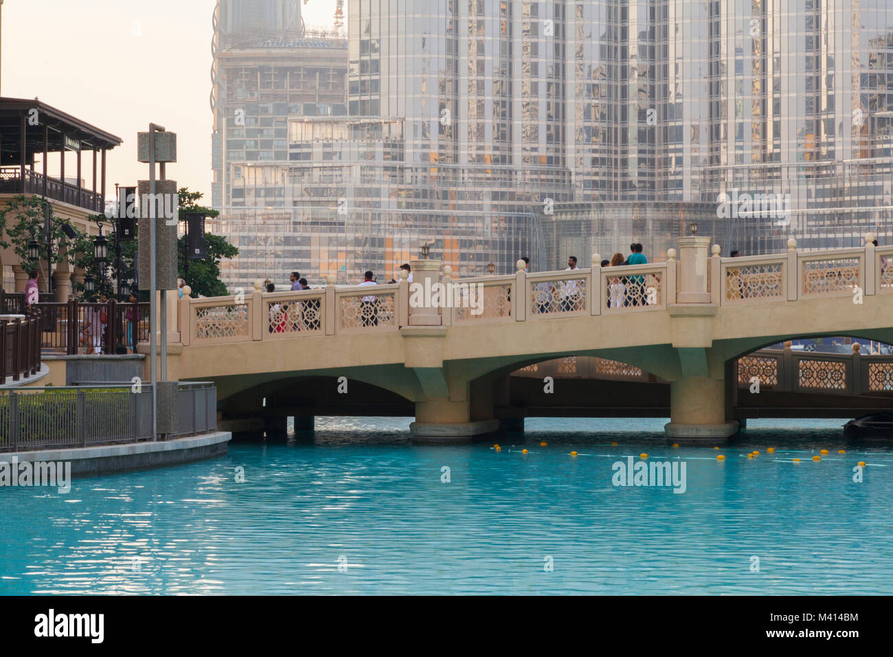 Bridge over river with Burj Khalifa in background known as the Burj ...