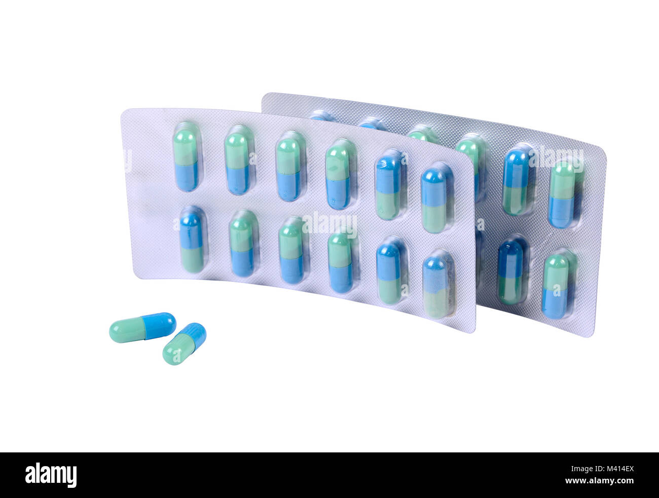 Capsules and two pills container isolated on white Stock Photo - Alamy